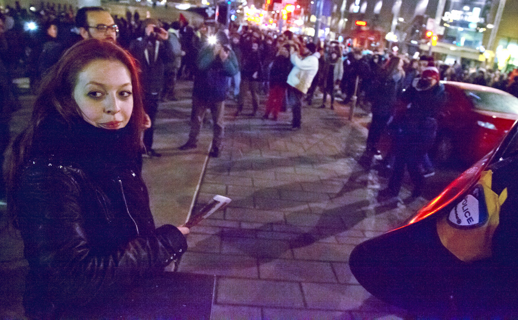 Red-haired Young Woman At The Night Protest | Pic Picks – The Link